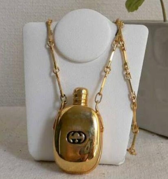 Vintage Gucci Golden Perfume Bottle Necklace With Logo By Endappi