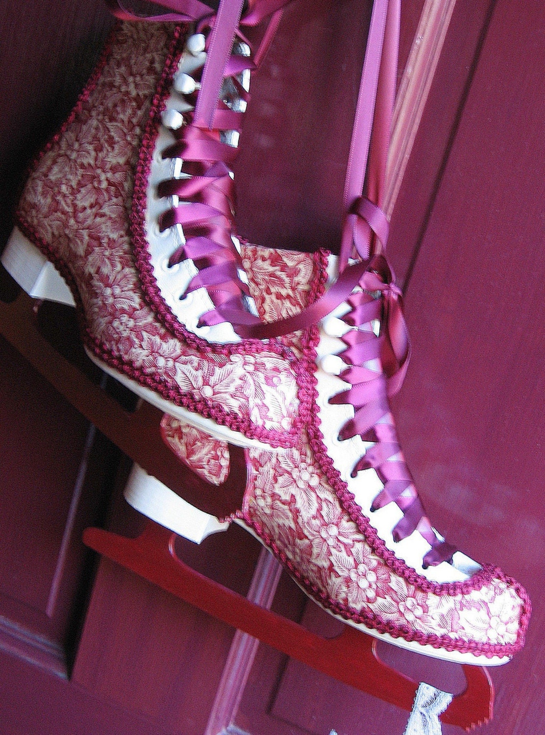 RESERVED FOR LINDA two pair of decorative painted ice skates