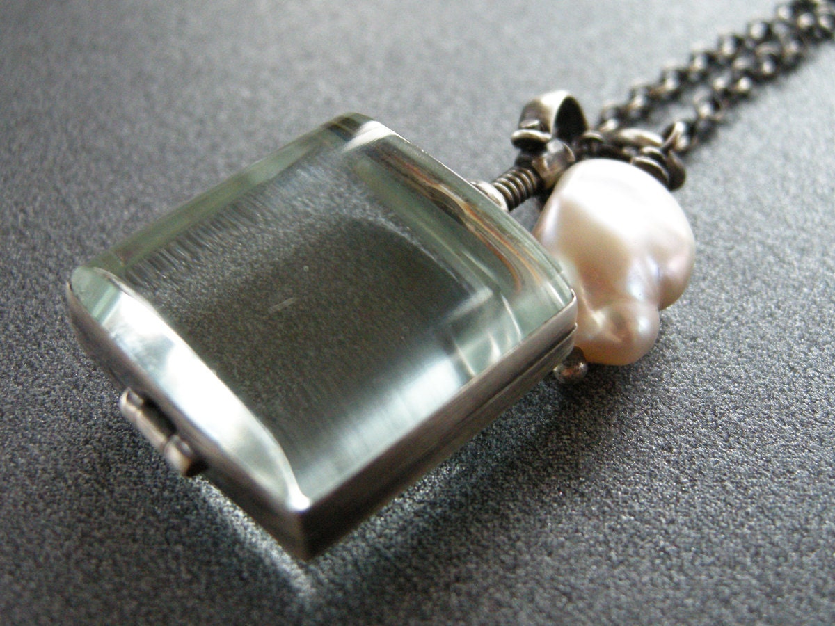 square sterling silver locket with antique glass and