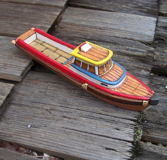 Red Blue and Yellow Wooden Toy Boat