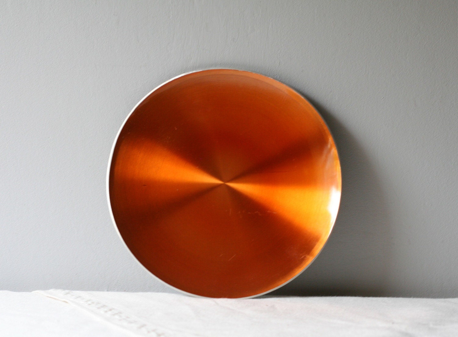 vintage orange metal plate