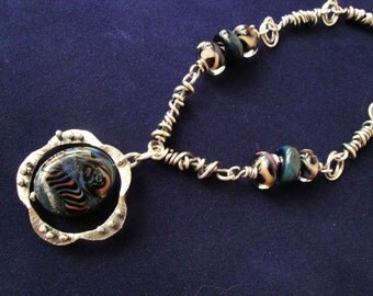 Earthy jewelry designs in silver and by DevineDesignsJewelry