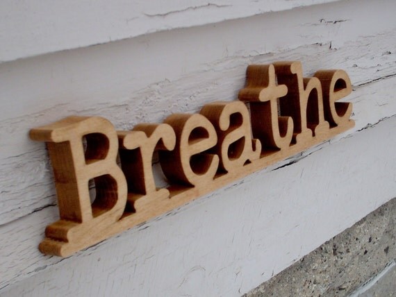 breathe wood sign