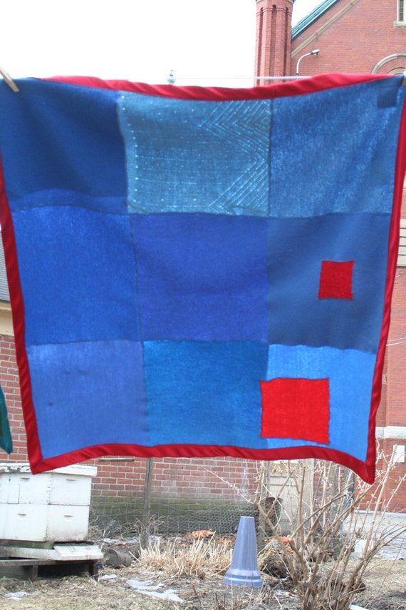 Items similar to Sapphire Crib Blanket with Crimson Edging on Etsy