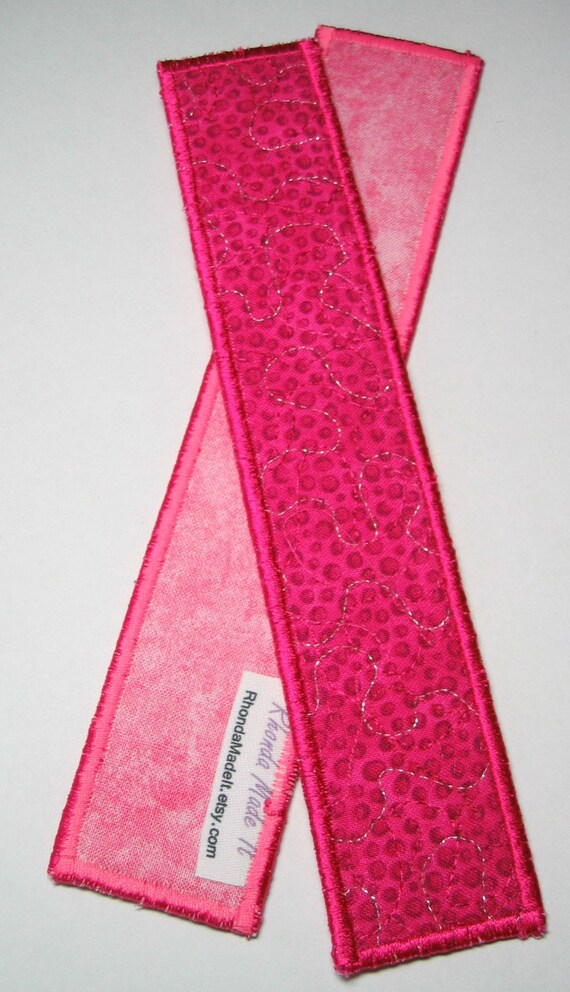 Hot pink bookmark with silver highlights