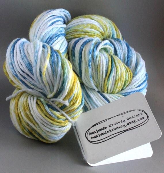 Blue yellow and white variegated cotton yarn: by BenjaminKrudwig