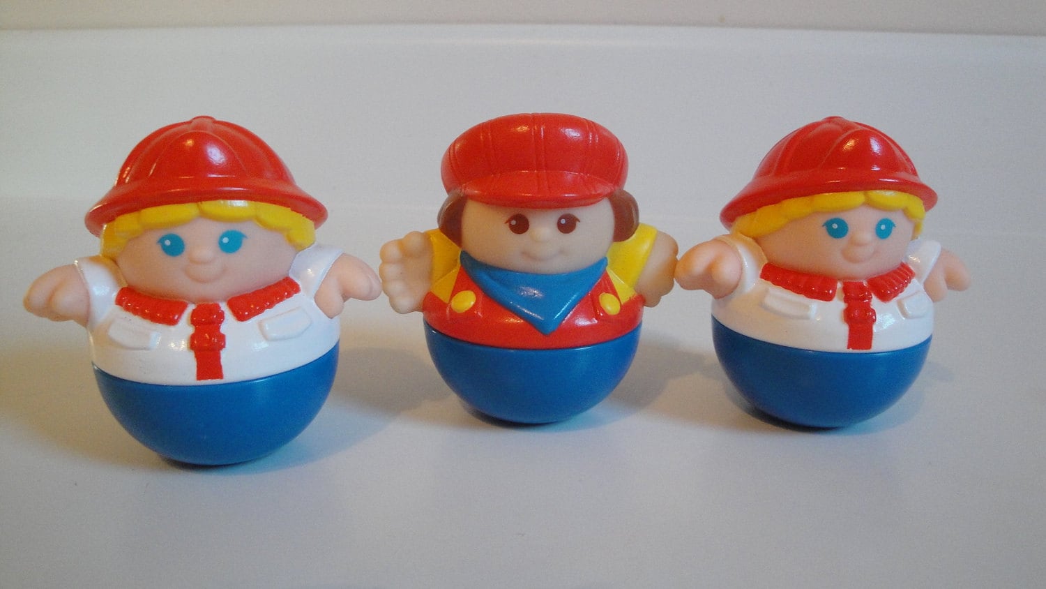 1980s Playskool Weeble Wobble People Fireman Train Engineer