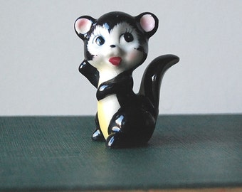 Ceramic skunk | Etsy