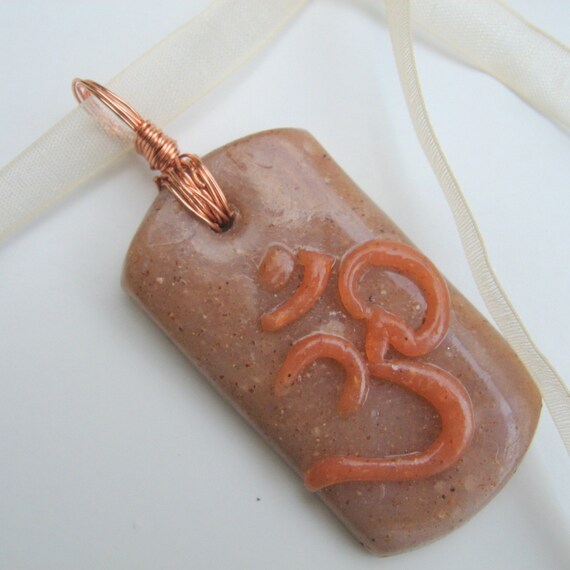 Items similar to Om symbol Polymer Clay Pendant on Etsy