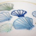 Embroidered Scallop Seashells in Ocean Blue Moss Green and