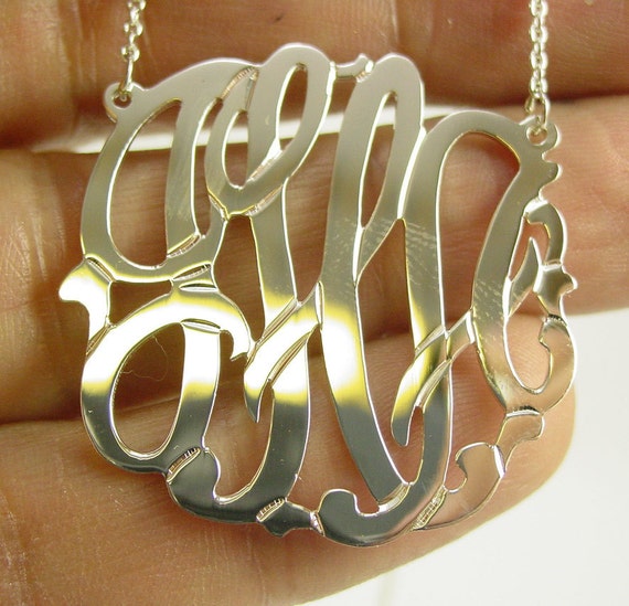 Silver monogram on 1 1/2'' diameter .any 3 letters