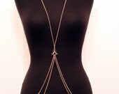 Items similar to bright gold double down body chain on Etsy