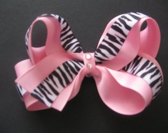 Items similar to Shocking Pink and Zebra Layered Boutique Bow on Etsy