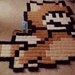 Giant 8 bit Mario Tanooki suit rug