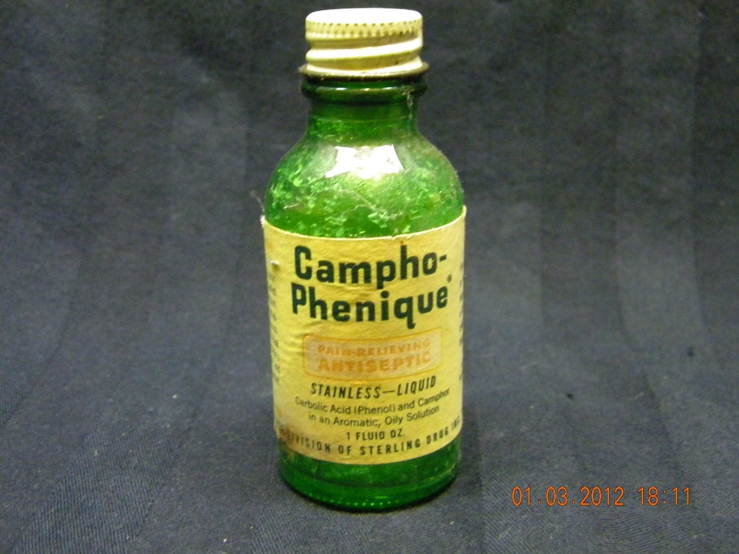 Vintage green bottle Campho Phenique bottle