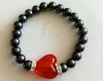 Popular items for red heart bracelet on Etsy