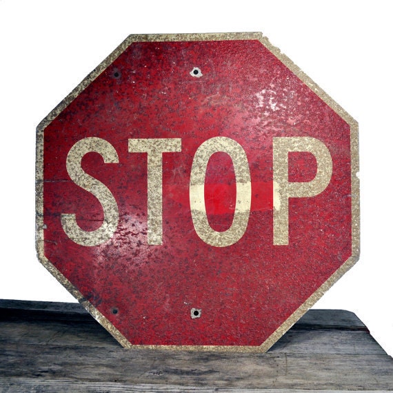 Rustic red octagonal old stop sign