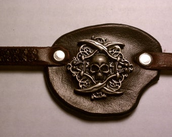 hand made leather eye patch with skull and swords