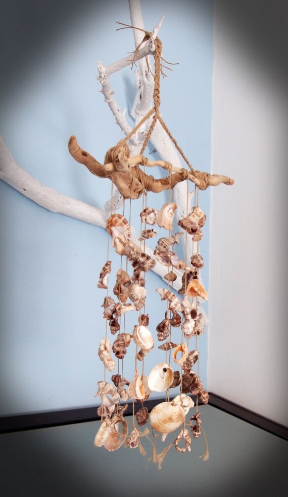 Items similar to Shell wind charm on Etsy