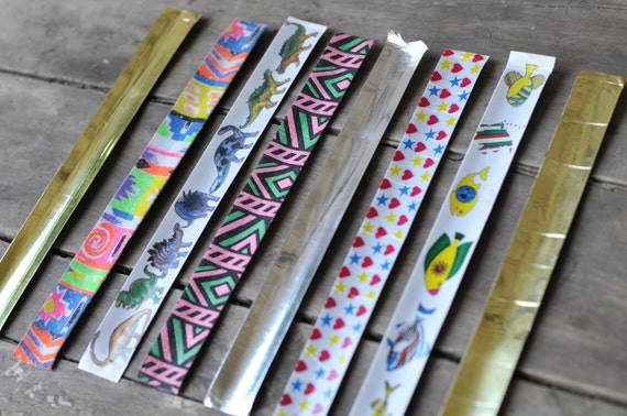 Items similar to TOTALLY 80s slap bracelets (set of 8) on Etsy