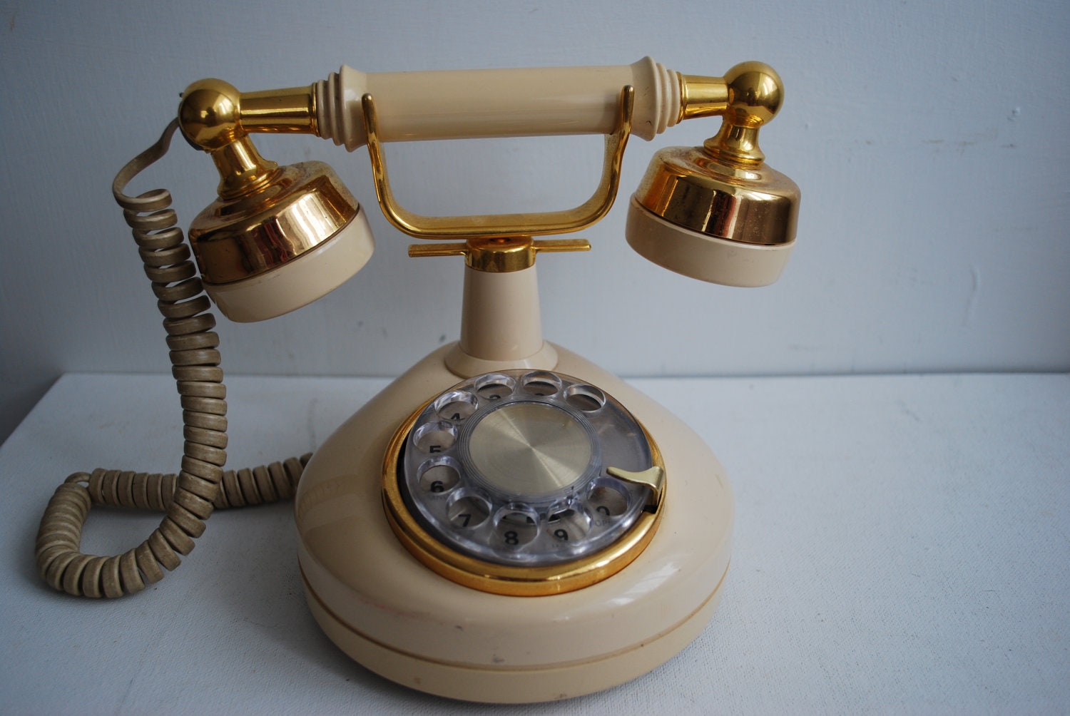 vintage beige french style rotary telephone