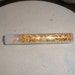 Vial of Loose Gold Flakes