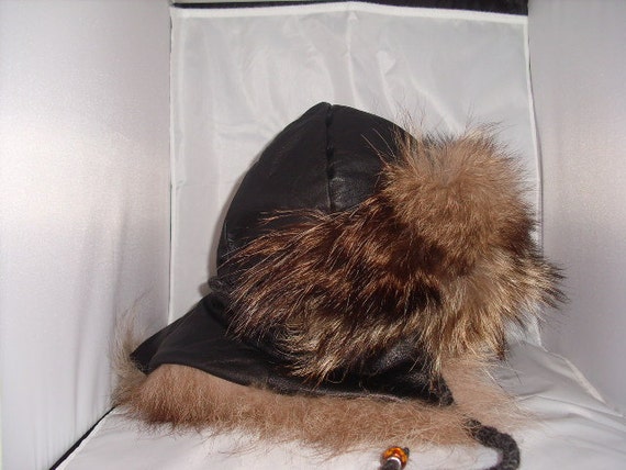 Mongolian Wolf fur hat with ear flaps and fur down by Micheleshats