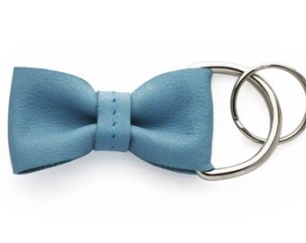 leather bow keychain with silver toned D-ring and keyring - light blue