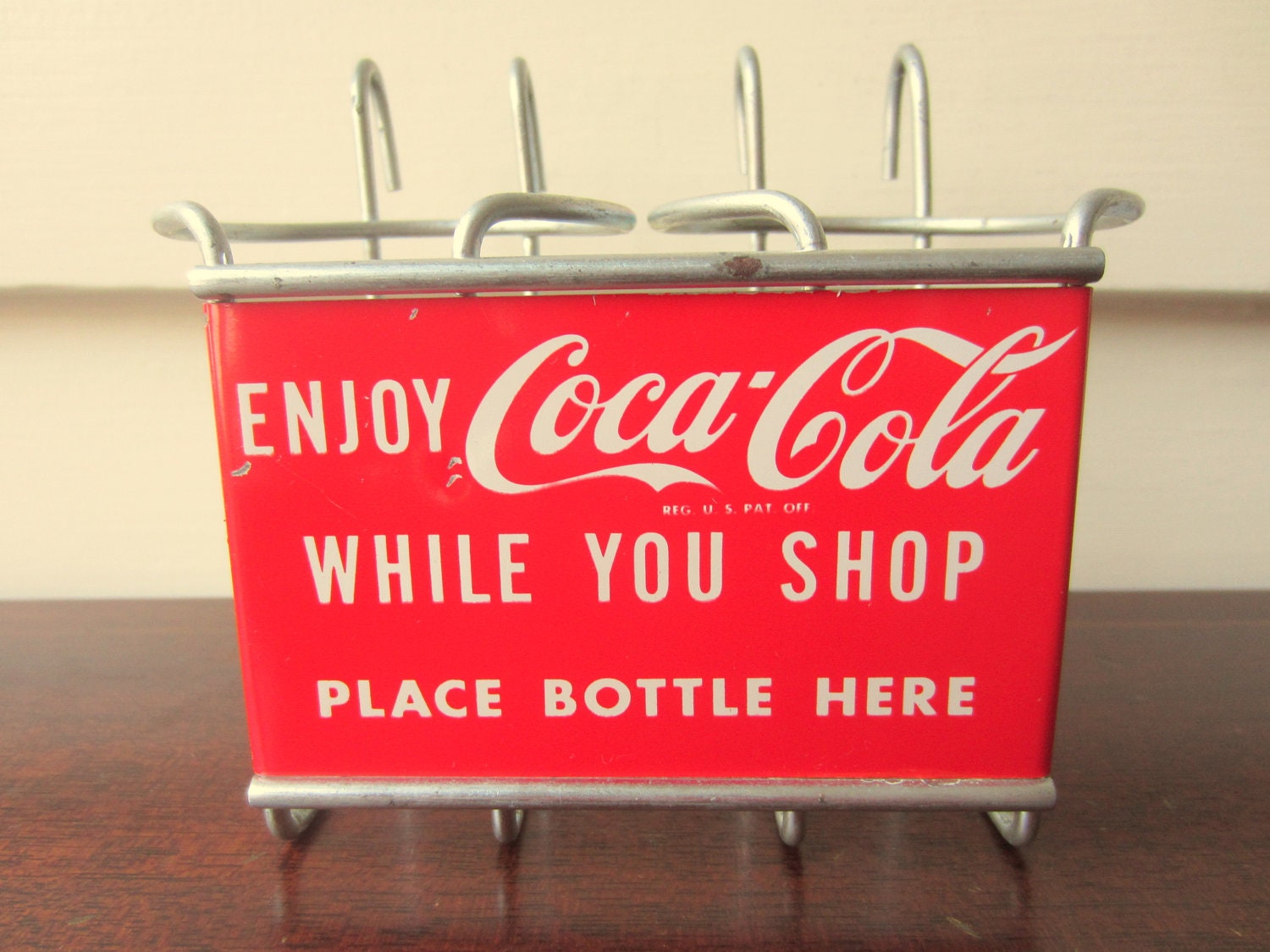 Coca cola bottle holder for shopping cart. 1950s coca cola