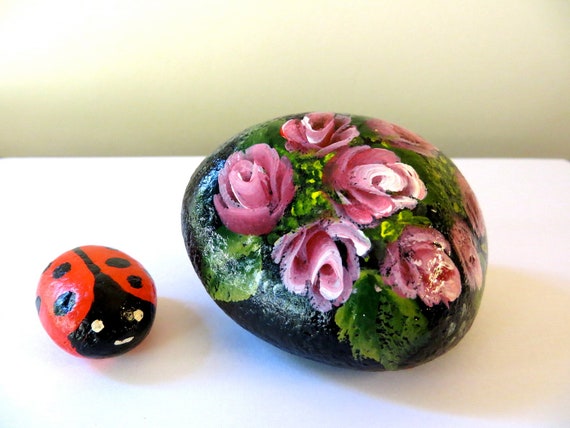Items similar to Set Of Handpainted Rocks With Roses And Ladybug on Etsy