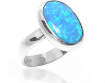 Popular items for blue opal ring on Etsy