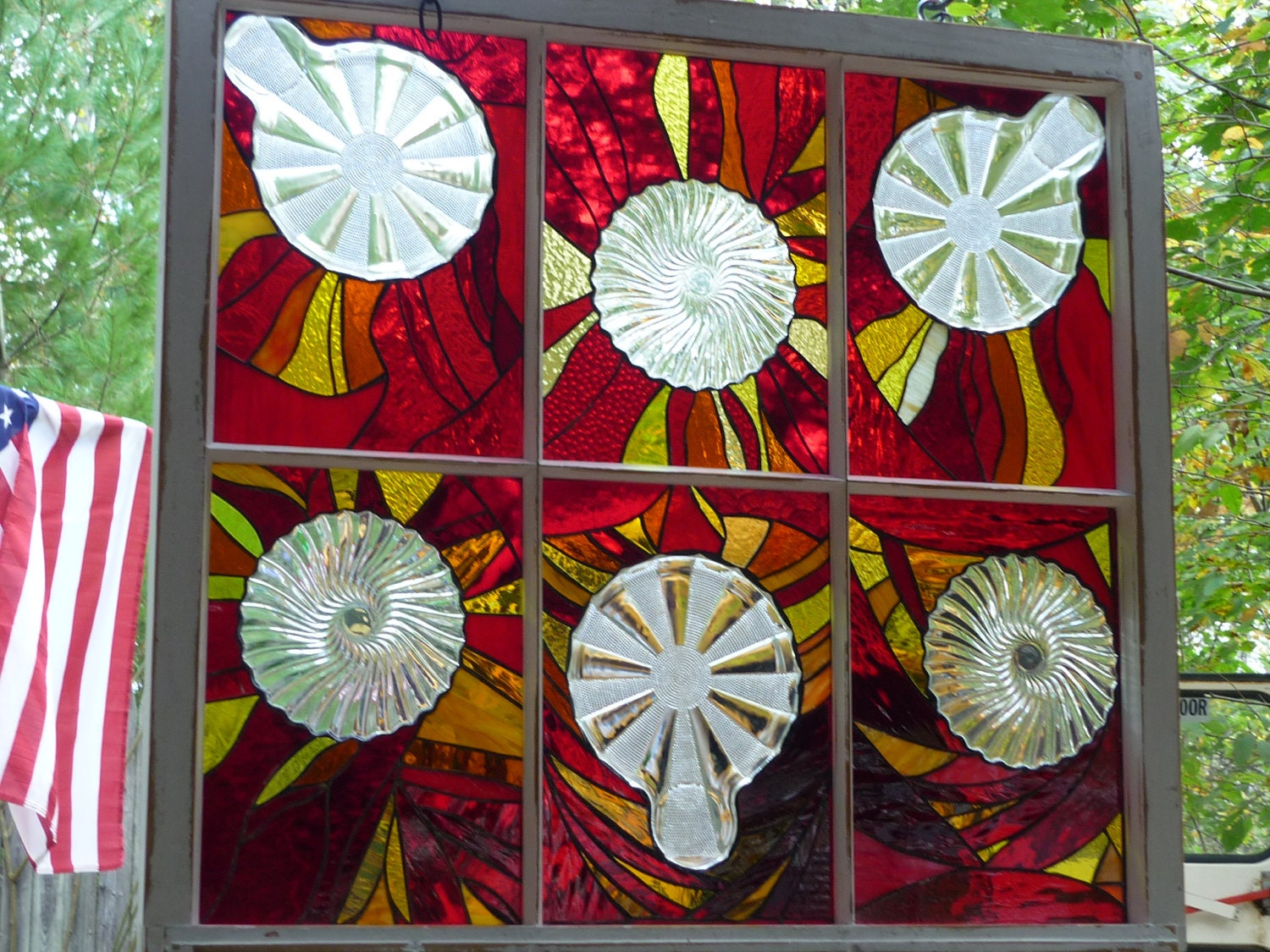 Stained glass window with vintage plates red & yellow tones of