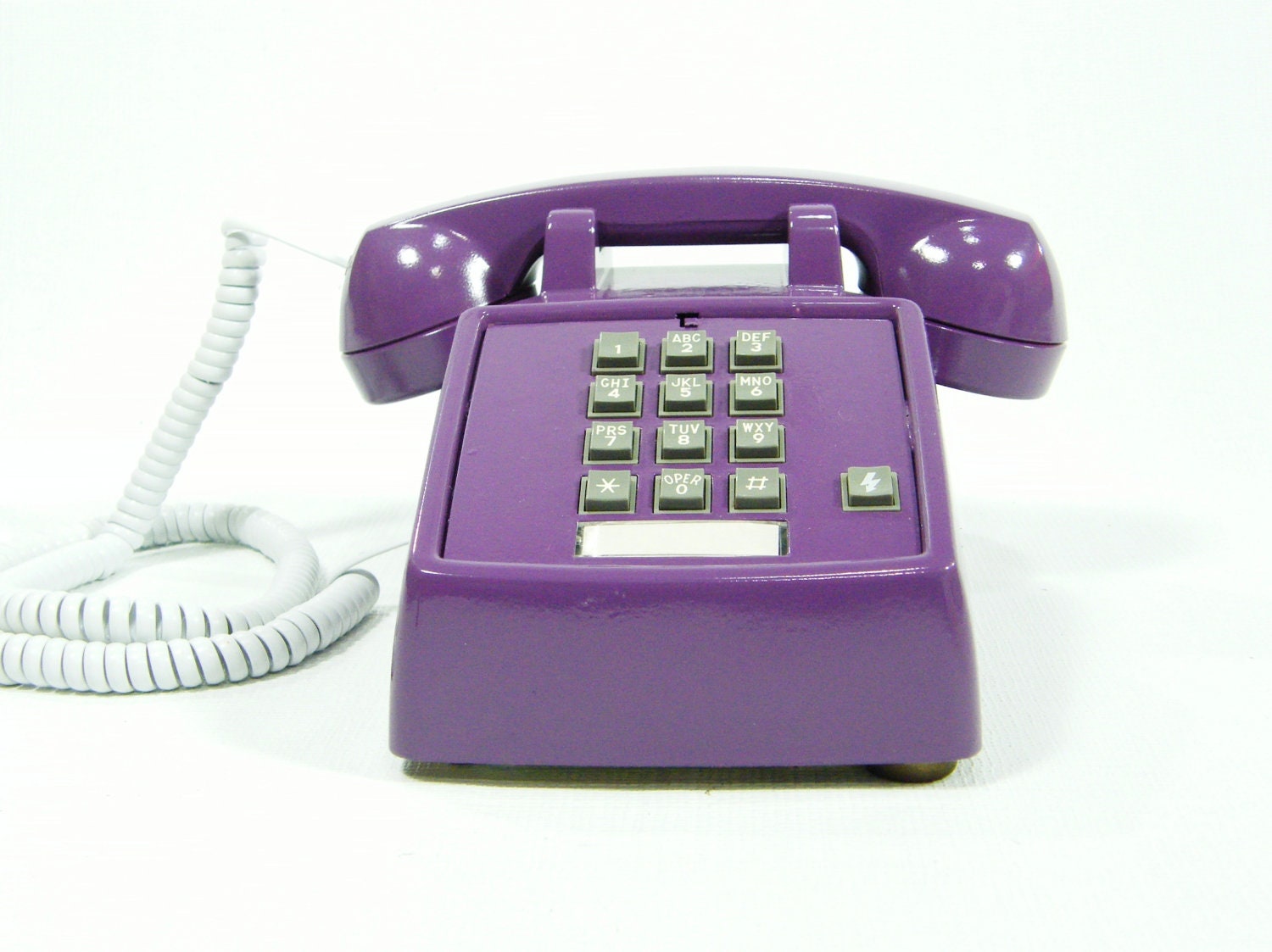 Vintage telephone plum purple push button phone