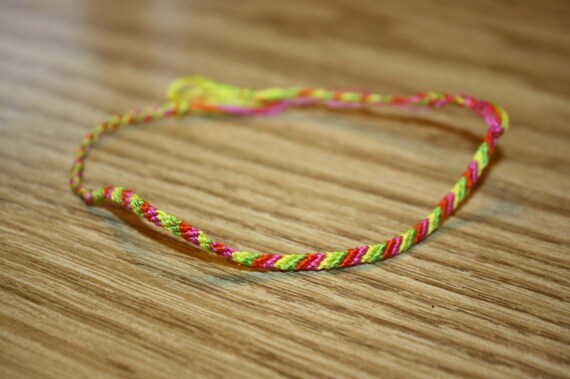 Items similar to handmade 4-string multi-colored friendship wrist ...