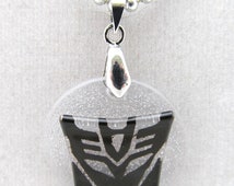 Popular items for decepticon symbol on Etsy