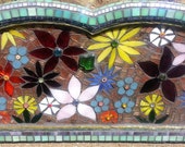 Mosaics made with new and found objects by ReclaimedMosaics