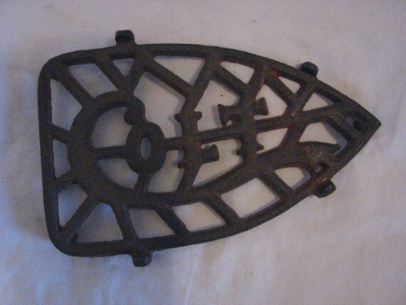 Colt Cast Iron trivet VINTAGE ADVERTISING