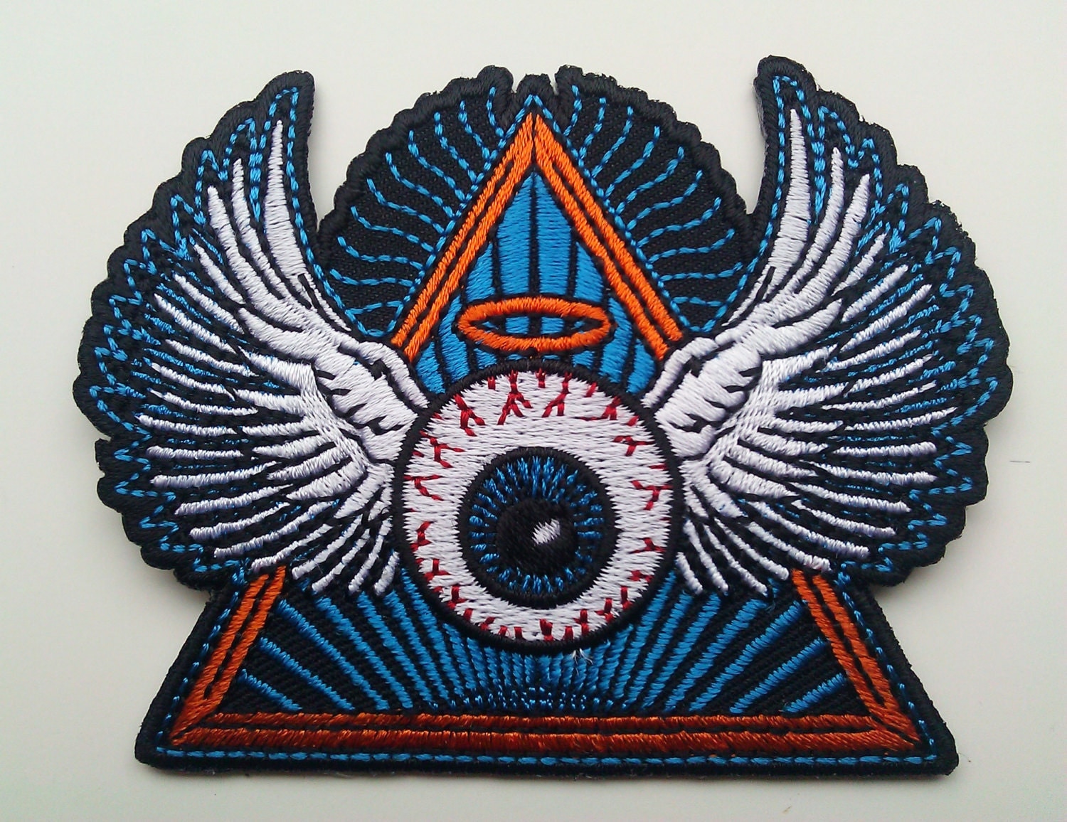Psychedelic flying eye with wings embroidered patch original