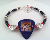 Popular items for guitar pick jewelry on Etsy