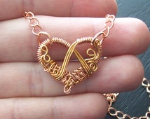 Popular items for wire heart pendant on Etsy