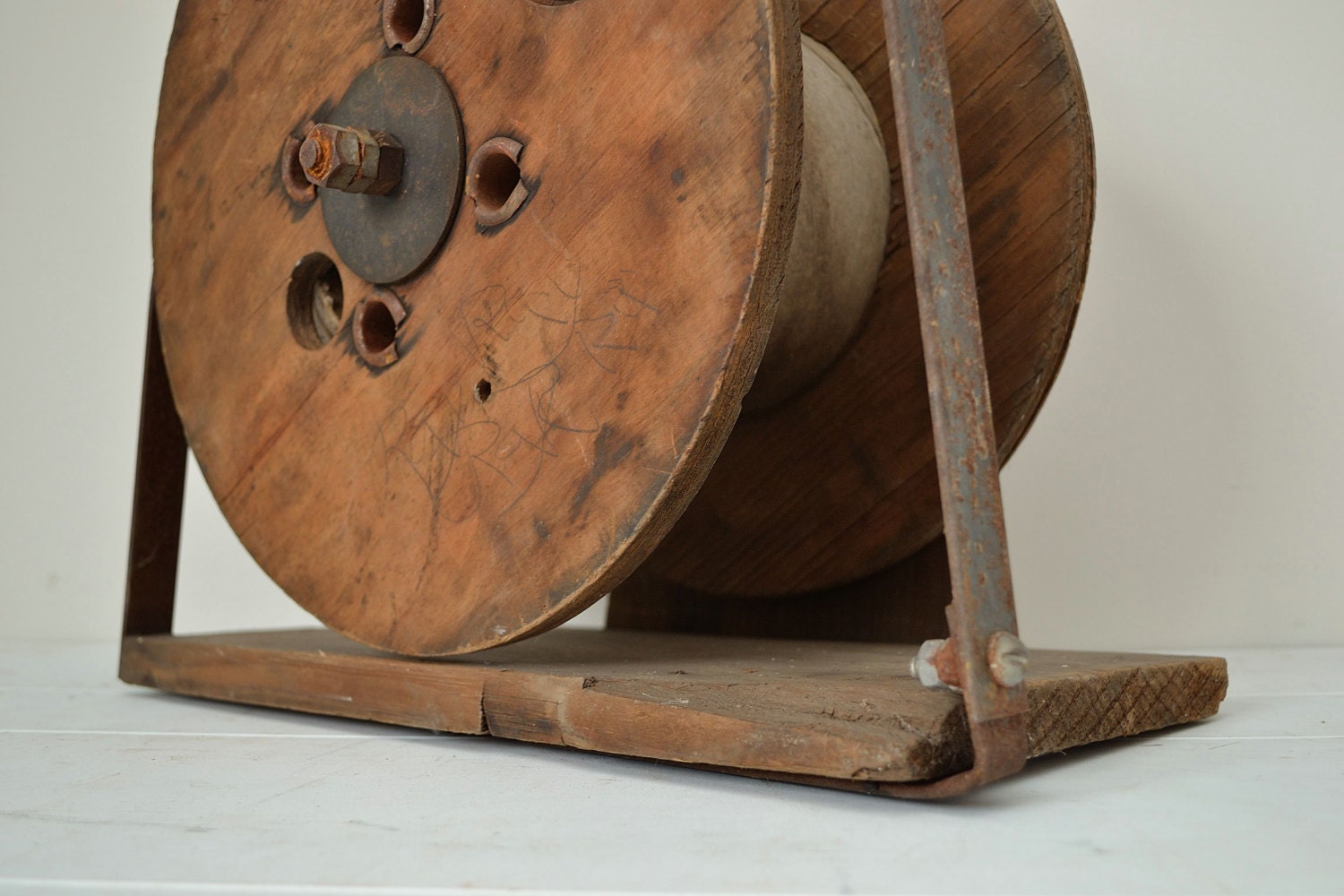 antique industrial wire spool and wooden reel by cupolavintage