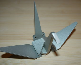 Coat Hook designed after a traditional origami crane.