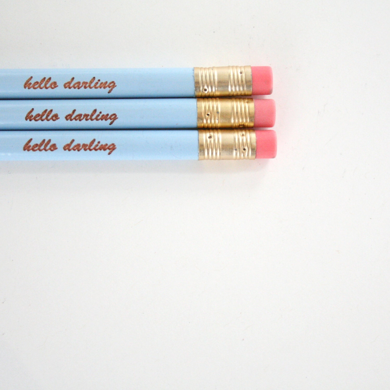 hello darling 3 baby blue engraved pencils in cursive.