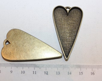 Popular items for elongated heart on Etsy
