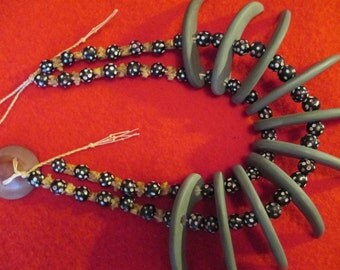 Bear claw beads | Etsy