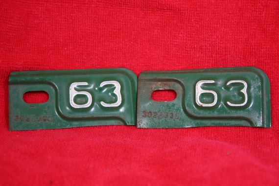 1963 Set Of Two Michigan License Plate Renewal Tabs
