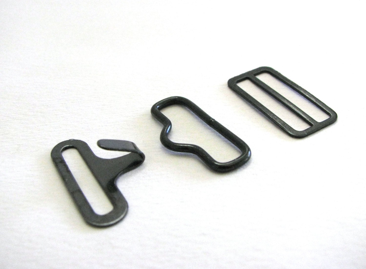 100 Bow Tie Sliding Hook Sets. Adjustable. Black Enamel 100 Bow Tie Sliding Hook Sets. Adjustable. Black Enamel