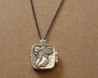 Angel locket | Etsy