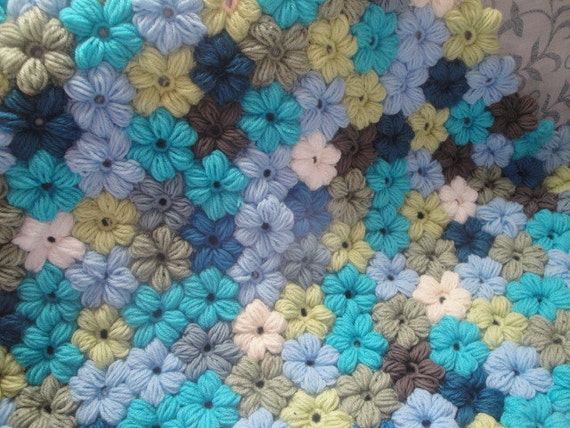 Items similar to Handmade crochet puff flower baby blanket in blue on Etsy
