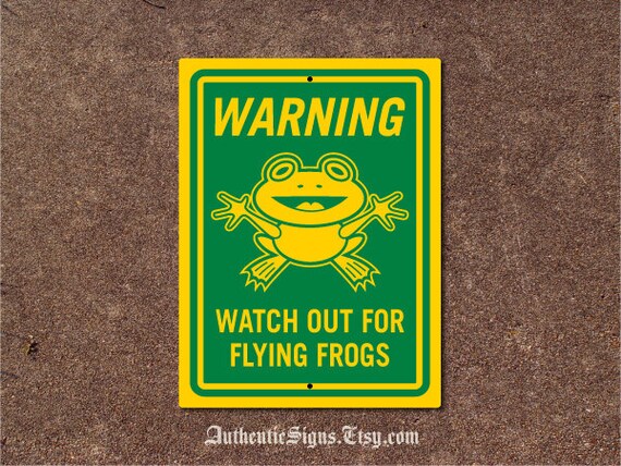 Items similar to Frog Sign - Warning Watch Out for Flying Frogs on Etsy